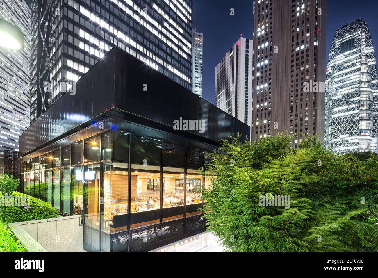 modern office buildings in downtown of tokyo at night Stock Photo - Alamy