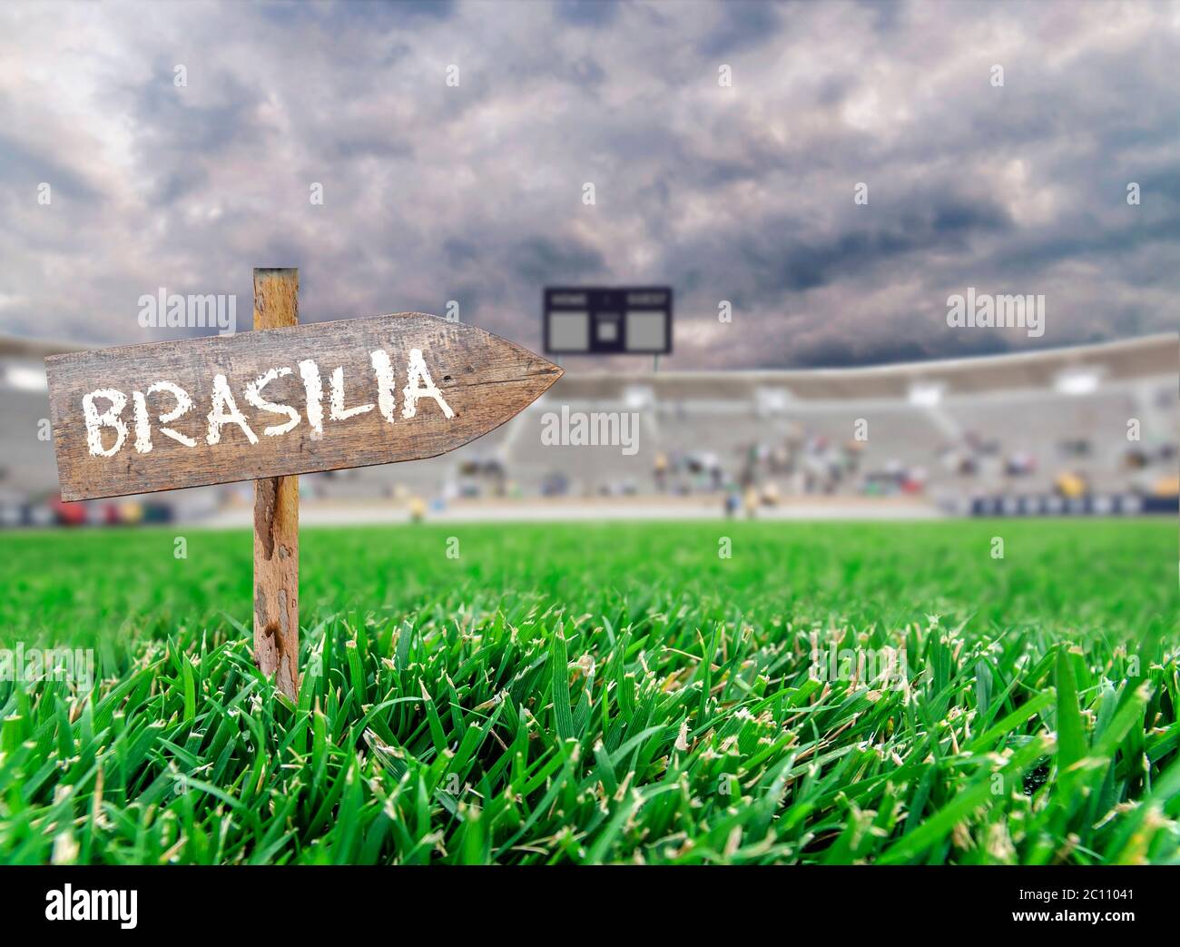 Soccer stadium with wood sign Stock Photo - Alamy