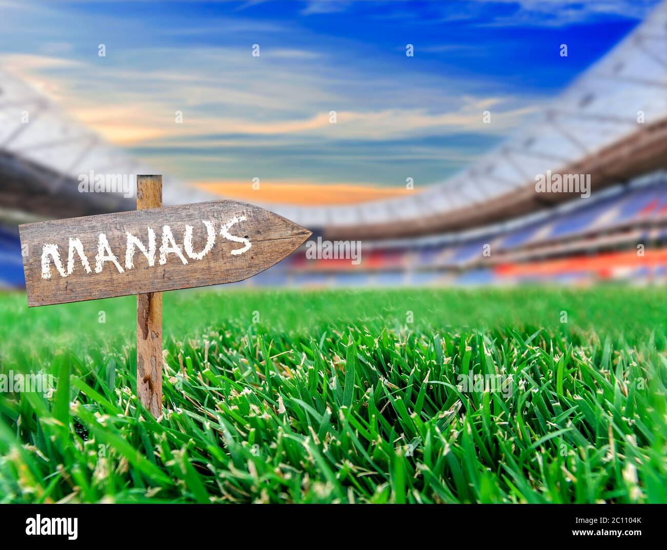 Soccer stadium with wood sign Stock Photo - Alamy