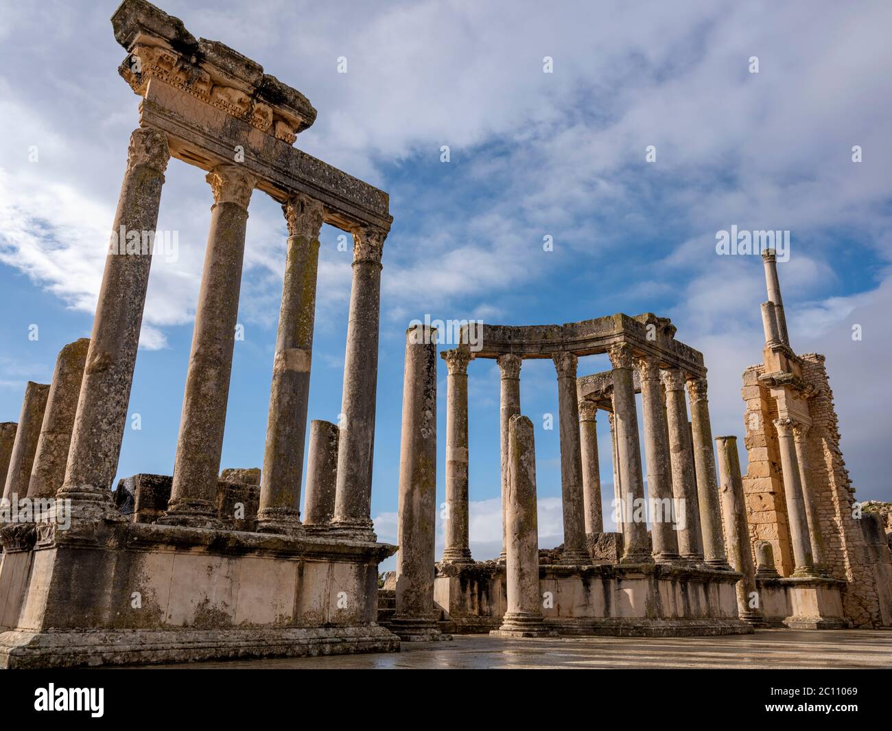 The ancient Roman archeological site of Dougga (Thugga), Tunisia, with ...