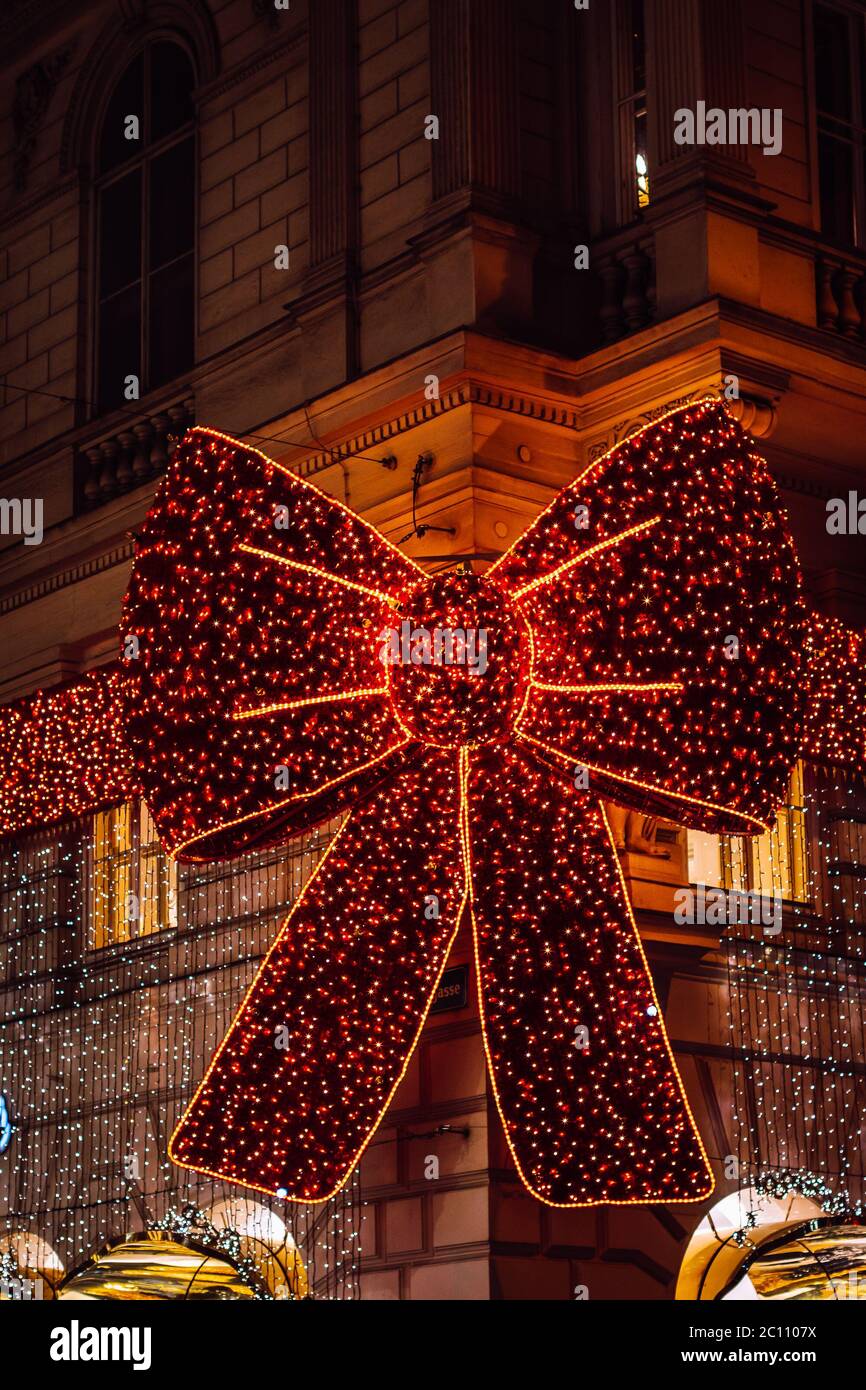 Celebratory Christmas design of the street in the form of a red bow ...