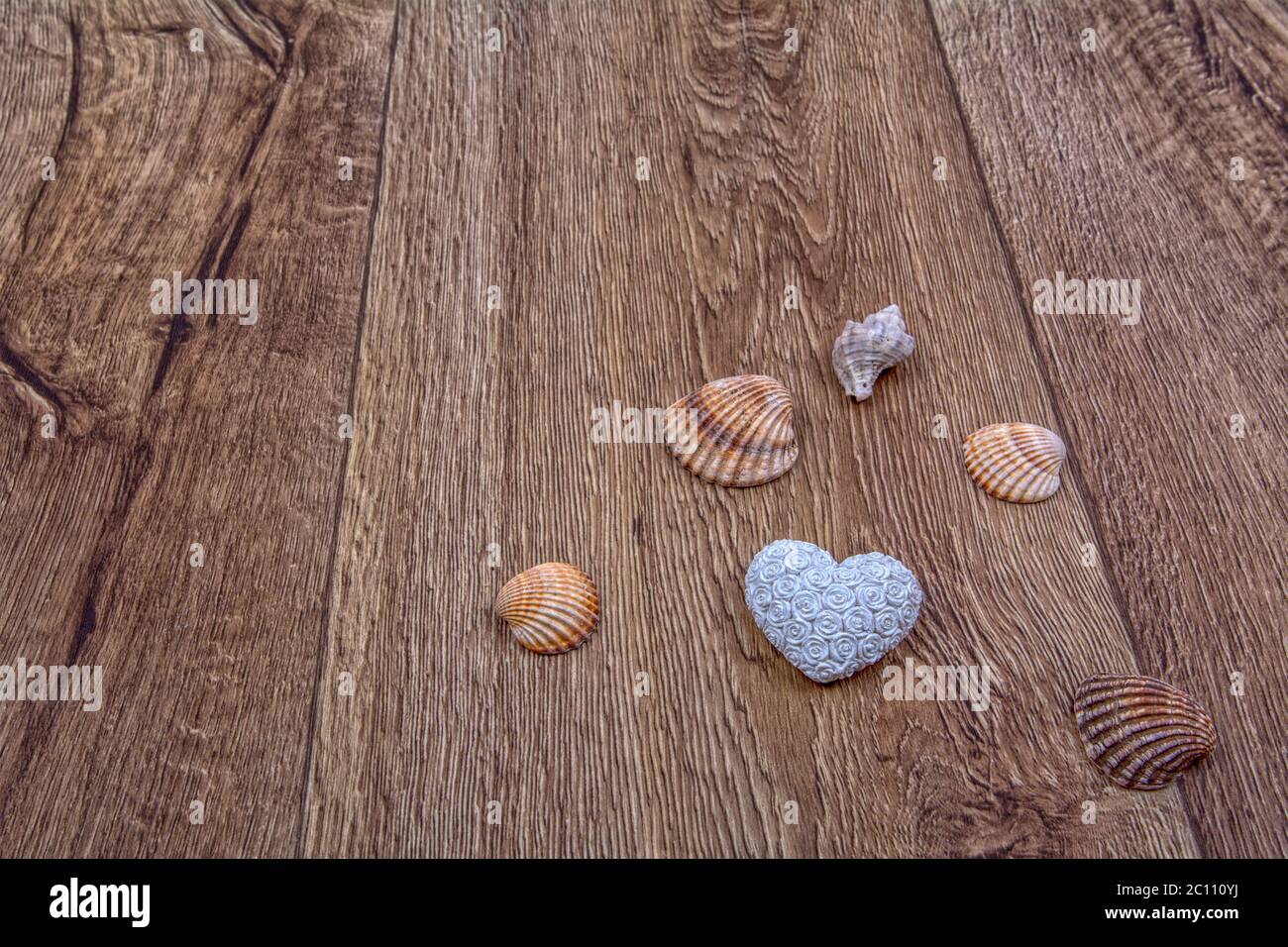 Heart sea shells on hi-res stock photography and images - Alamy