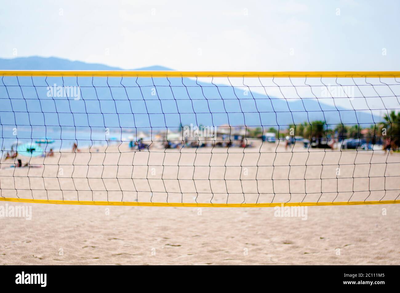 Beach volleyball net on the beach close Stock Photo - Alamy