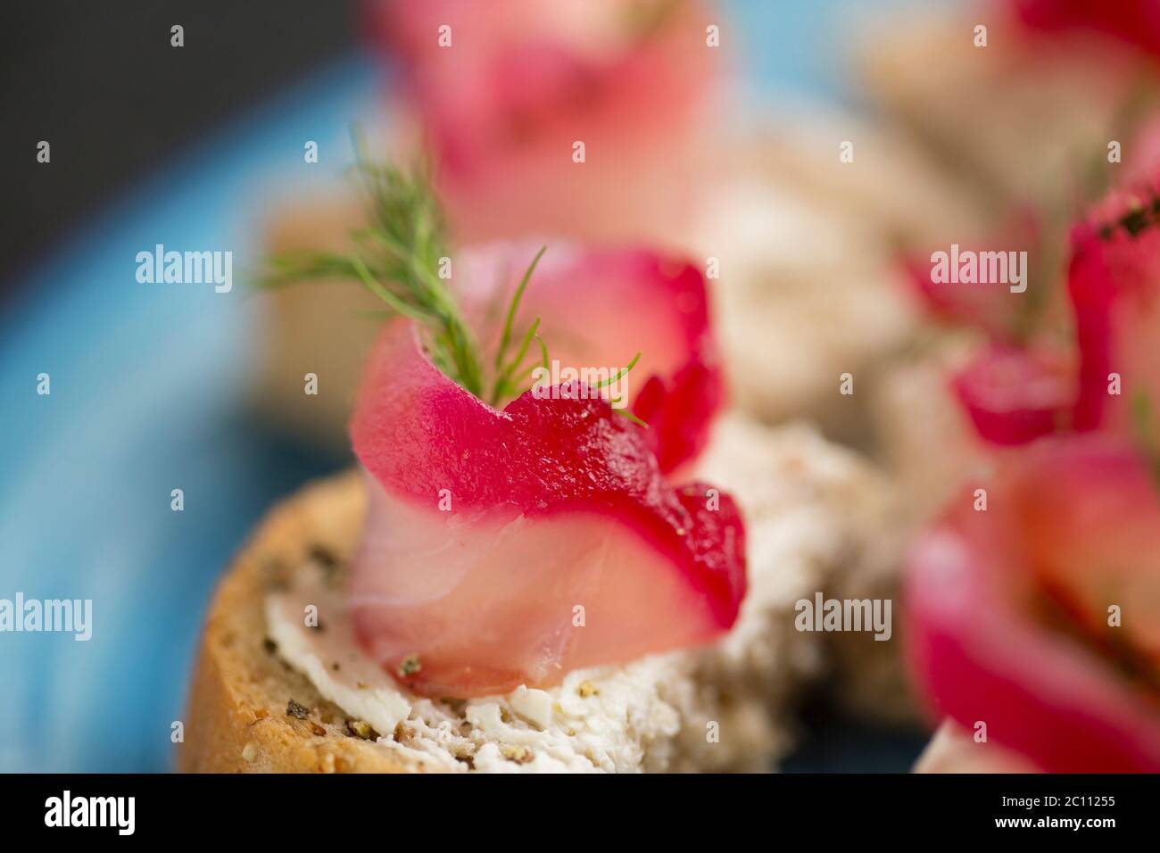 Slices from a bass, Dicentrarchus labrax, that was caught beach fishing ...