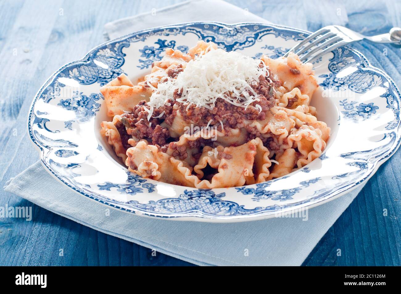 mafalda type pasta with ragu bolognese Stock Photo - Alamy