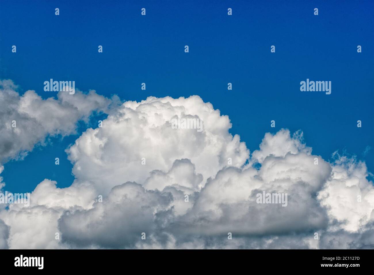 Sky background with a tiny clouds Stock Photo - Alamy