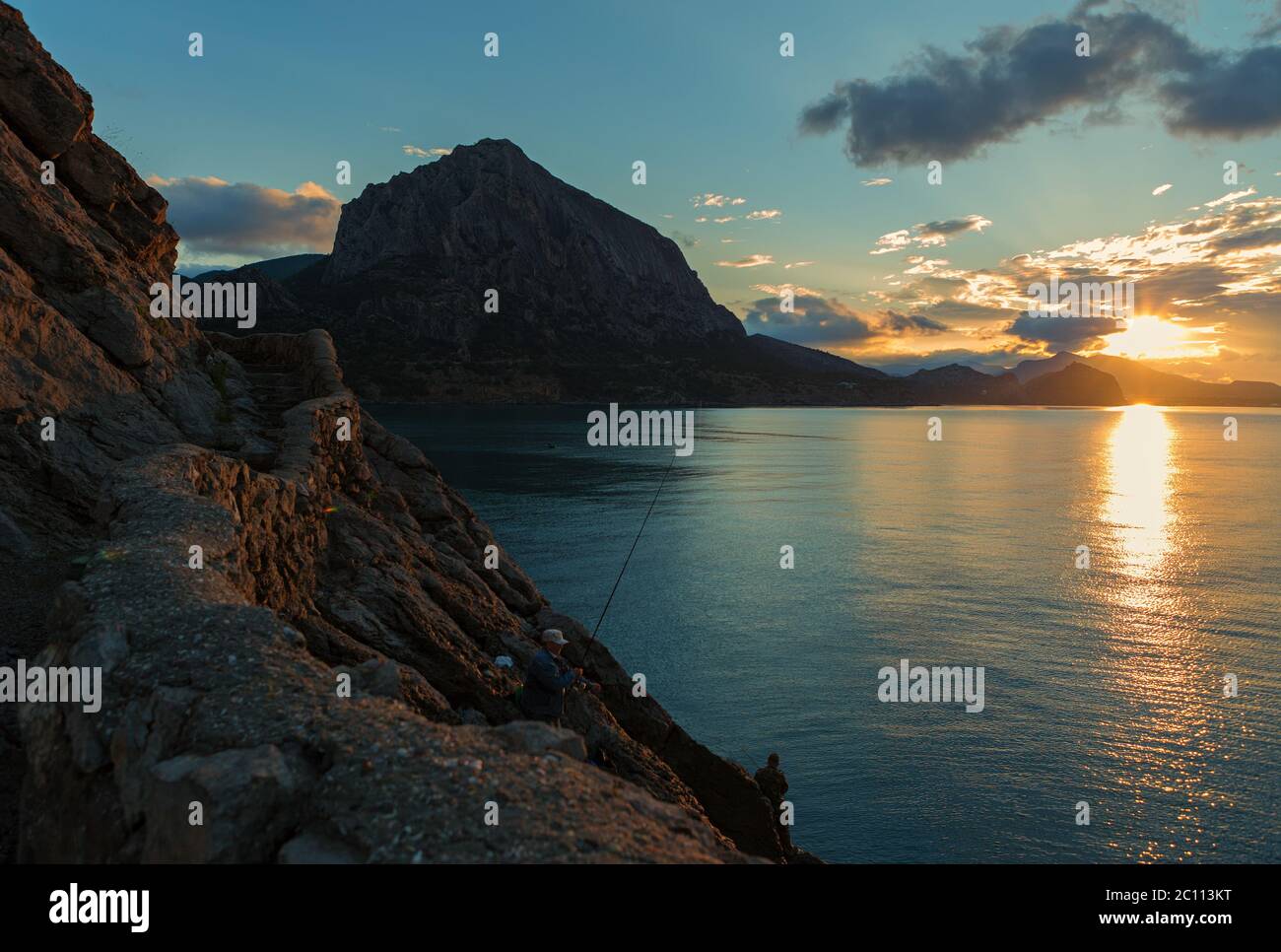 Beautiful sunrise in the Blue Bay near village Novyi Svit. Crimea Stock ...