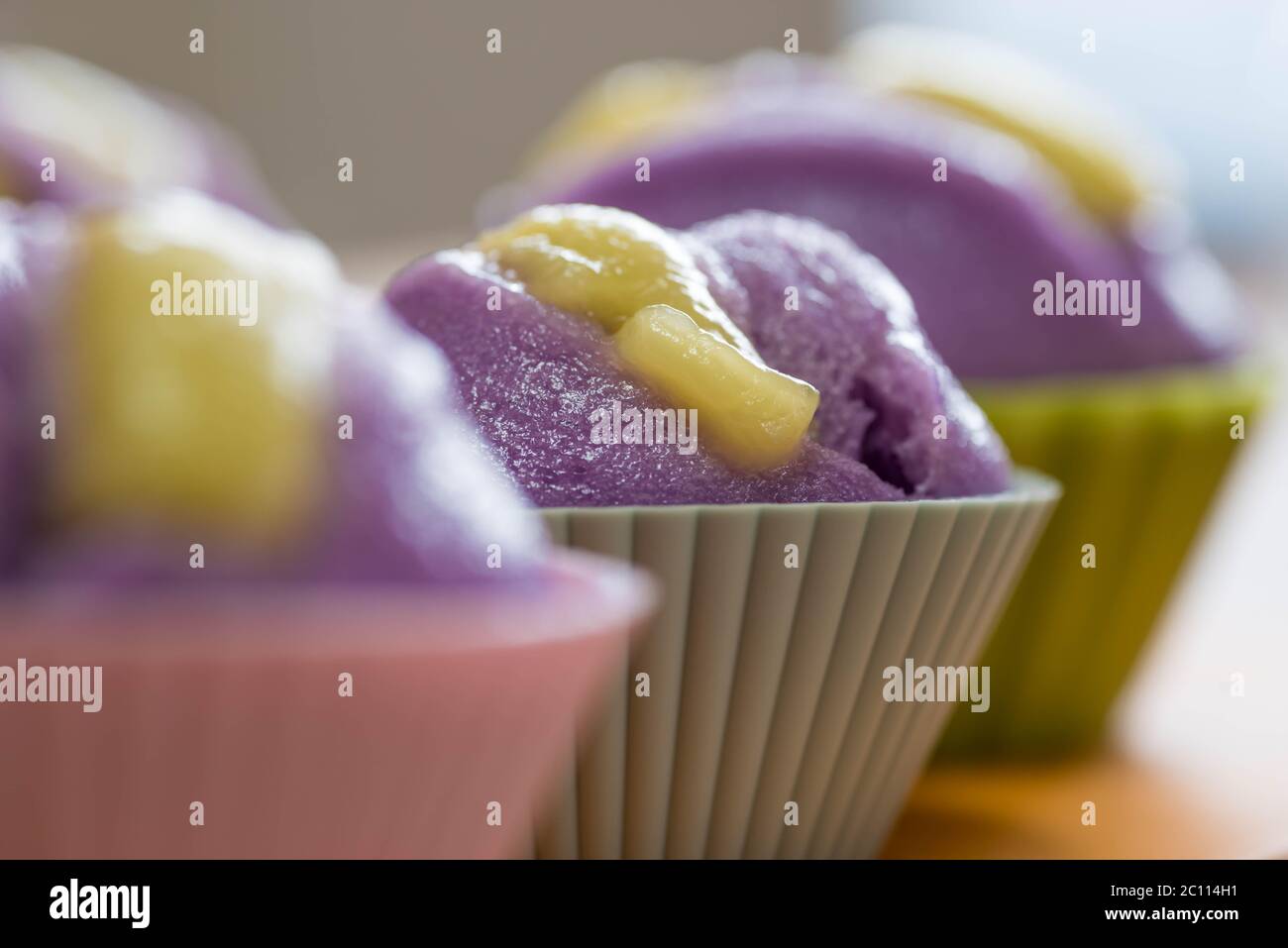 Ube puto with cheese.A Filipino style rice cupcake muffin with ube ...