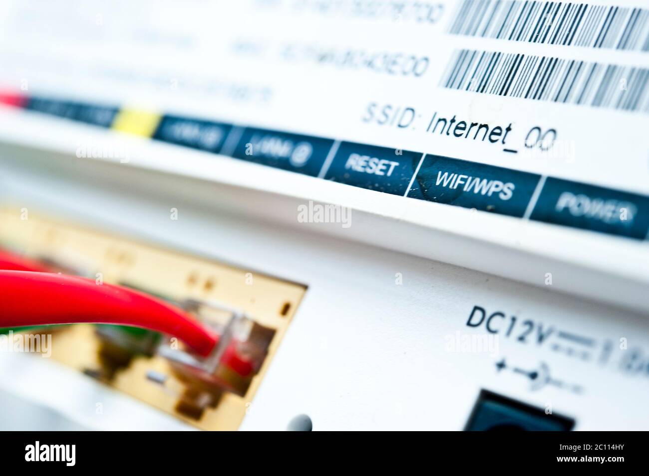 sockets and cables on the back of a broadband ethernet router Stock ...