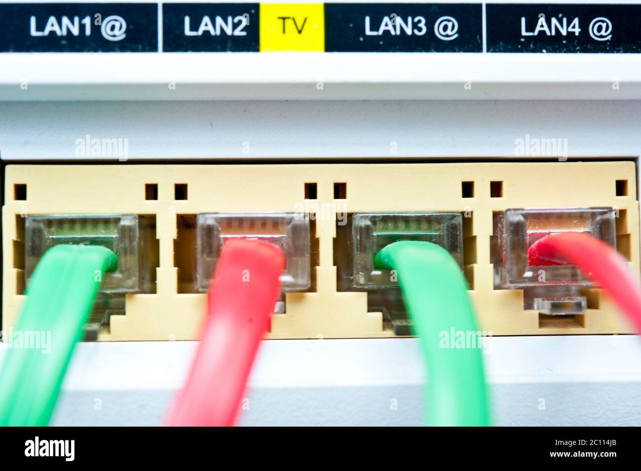 sockets and cables on the back of a broadband Ethernet router Stock ...