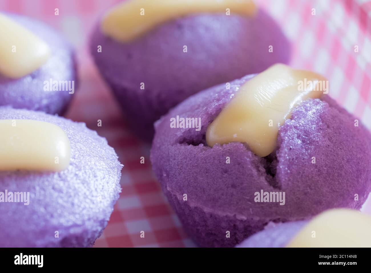 Ube puto with cheese.A Filipino style rice cupcake muffin with ube ...