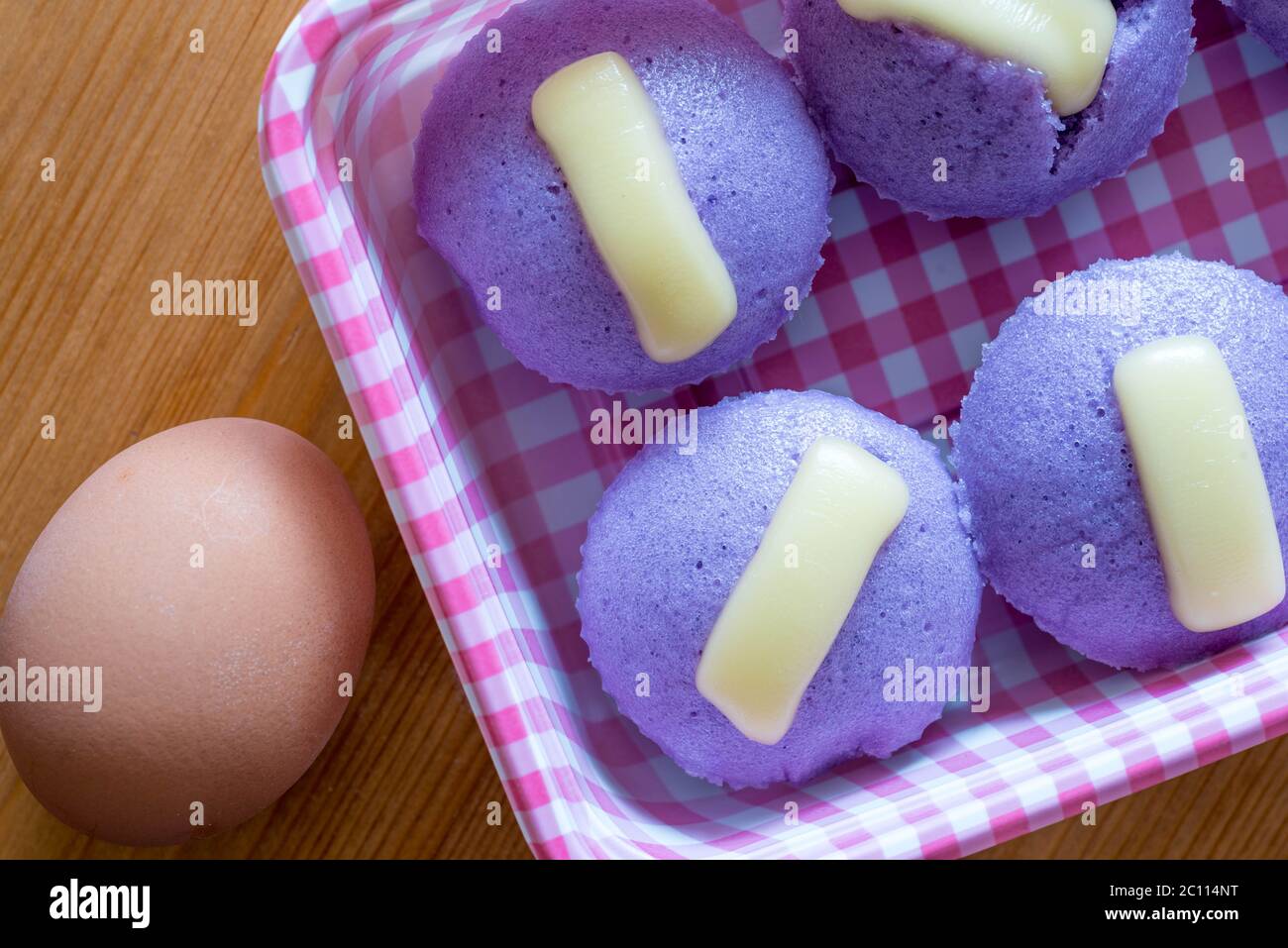 Ube puto with cheese.A Filipino style rice cupcake muffin with ube ...
