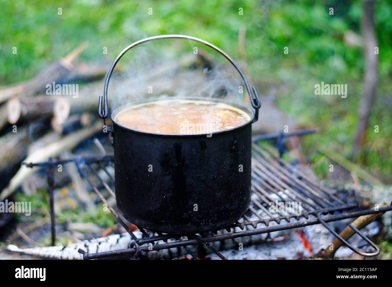 Family cooking kettle flame hi-res stock photography and images - Alamy