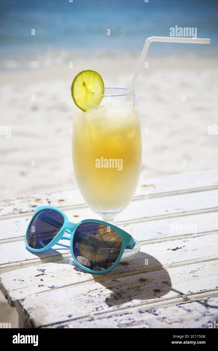 Fresh tropical cocktail with rum on beautiful sunny beach Stock Photo ...