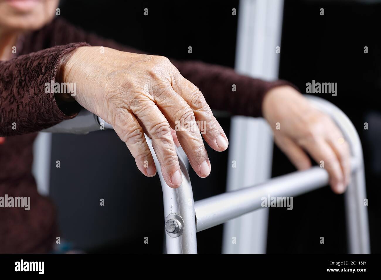 Aged woman using a walker hi-res stock photography and images - Alamy