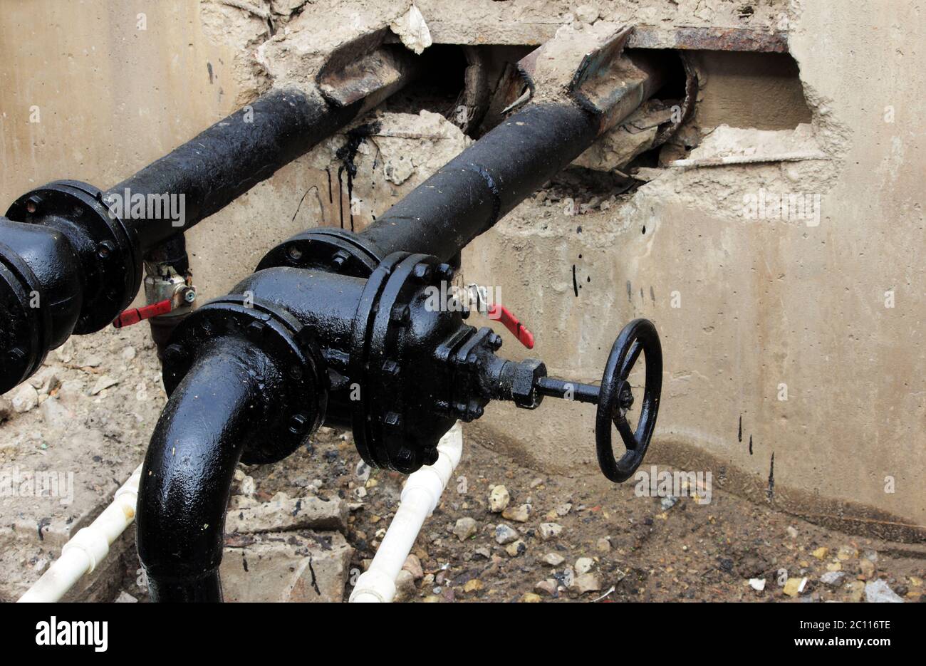 black pipe with a tap, processed bitumen polymer mixture Stock Photo ...