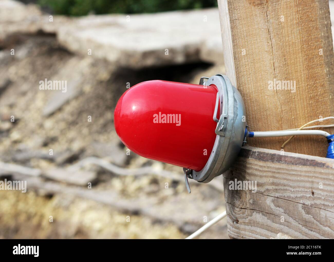 Red warning light which enclosing the ditch, where the repair of water ...