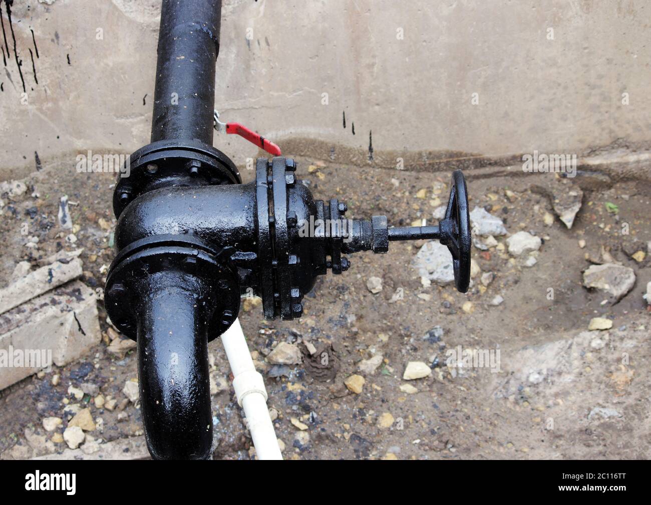 black pipe with a tap, processed bitumen polymer mixture Stock Photo ...