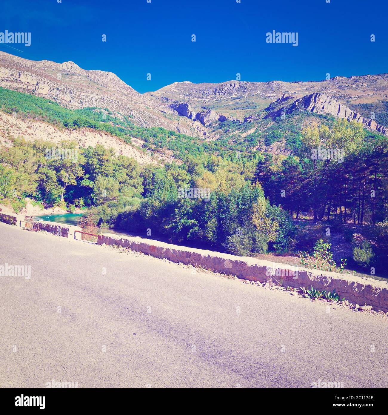Mountain road along river hi-res stock photography and images - Alamy