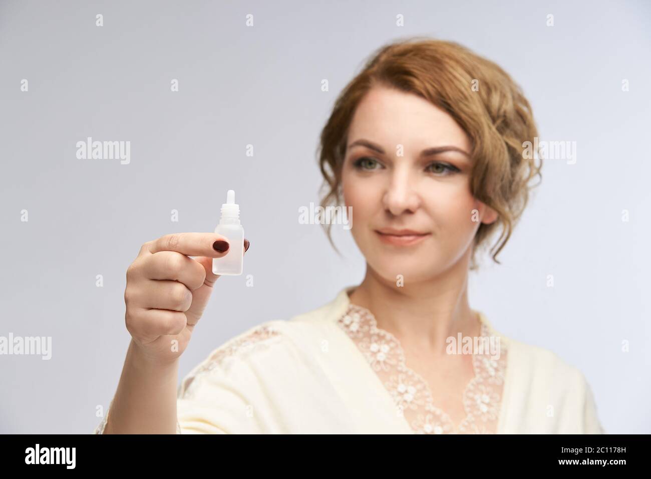 Woman apply eye drops. Girl glaucoma treatment Stock Photo - Alamy