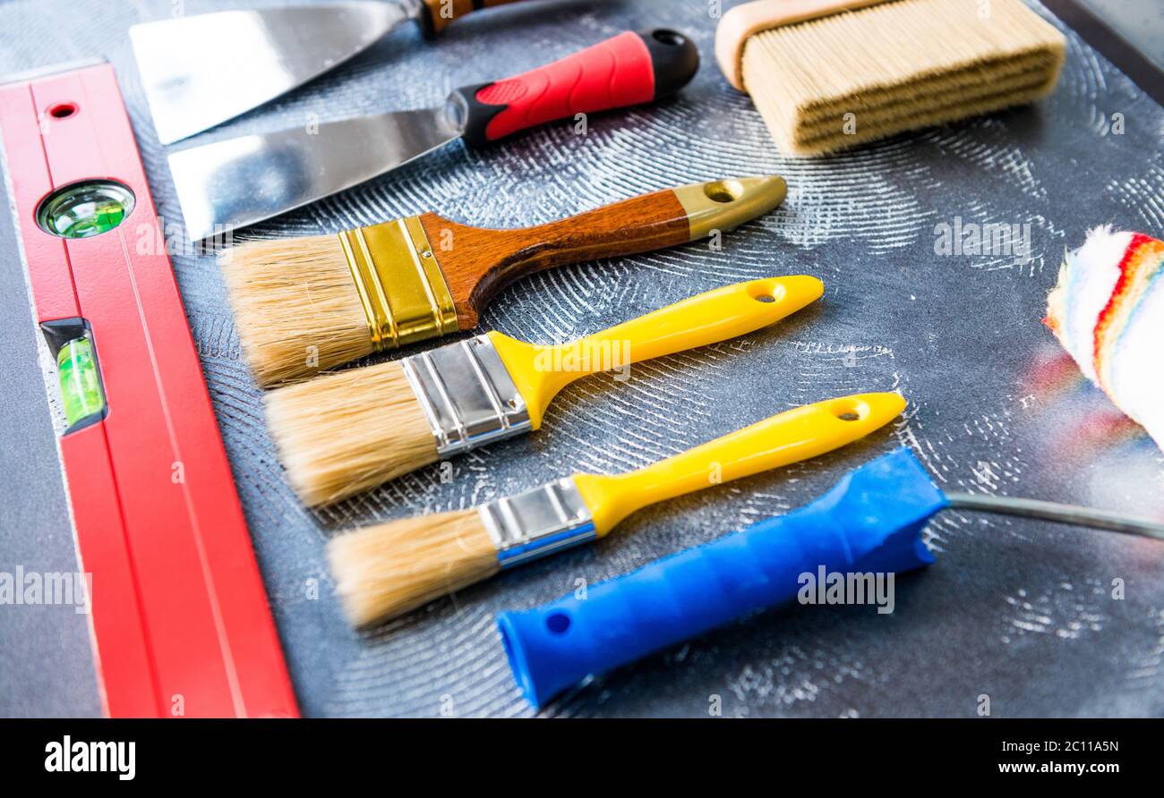 mix of handle working tools at abstract textured cement surface Stock ...