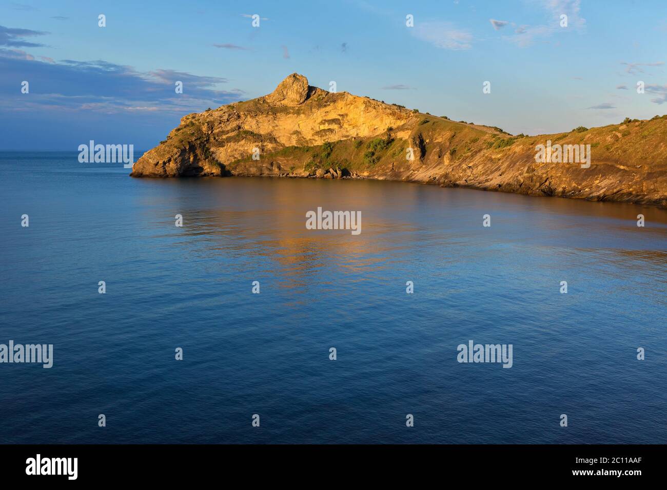 Beautiful Cape Kapchik in the Black Sea illuminated rising sun. Crimea ...