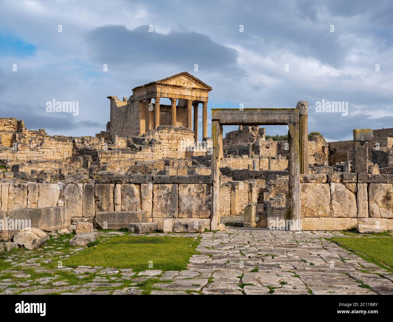 The ancient Roman archeological site of Dougga (Thugga), Tunisia with ...