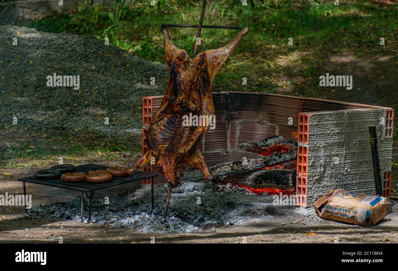 Lamb Al Asador, Argentinian Barbecue BBQ lamb over the fire Stock Photo ...