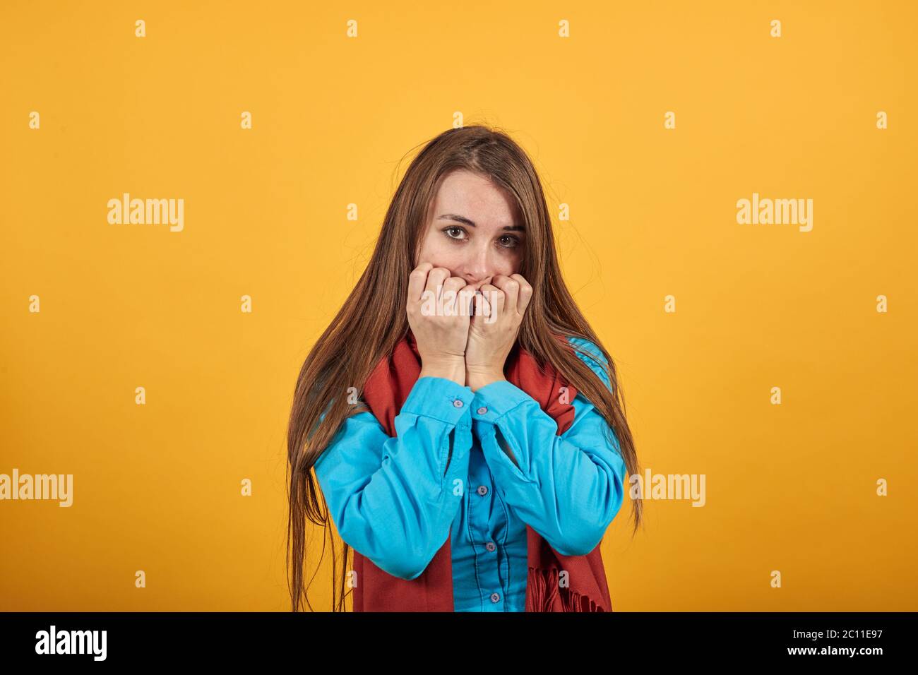 Scared, biting fists emotionally. Covering mouth behind knuckle. Having ...