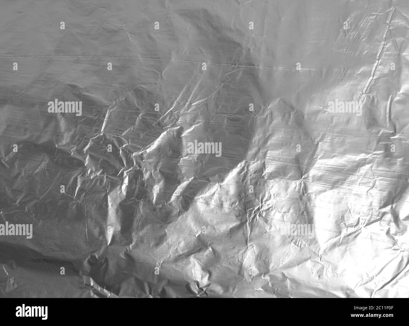 Color texture of creased kitchen aluminum foil Stock Photo - Alamy
