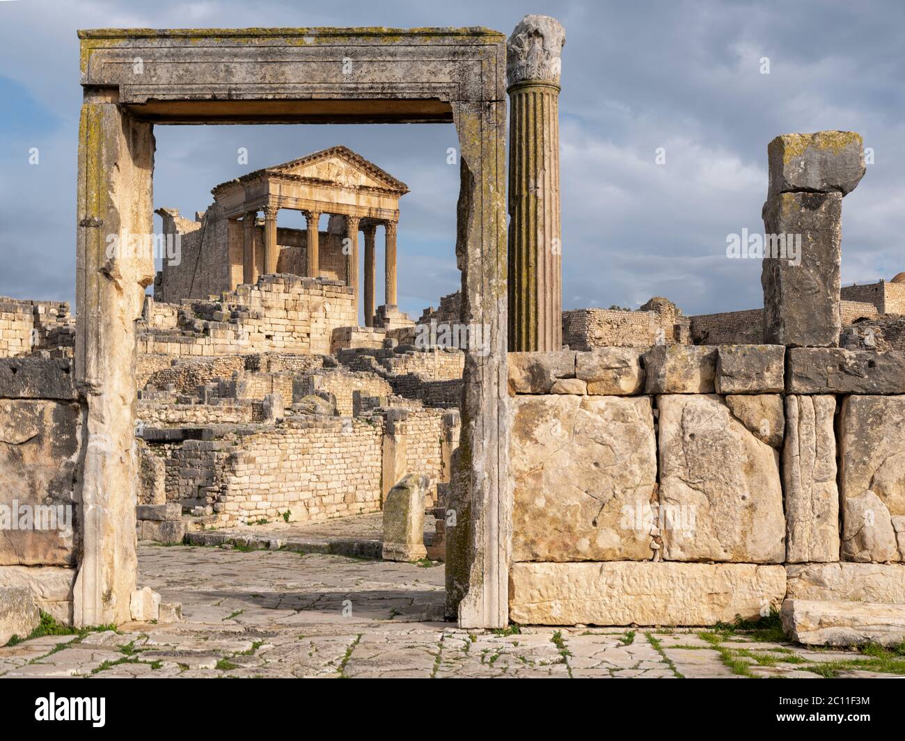 The ancient Roman archeological site of Dougga (Thugga), Tunisia with ...