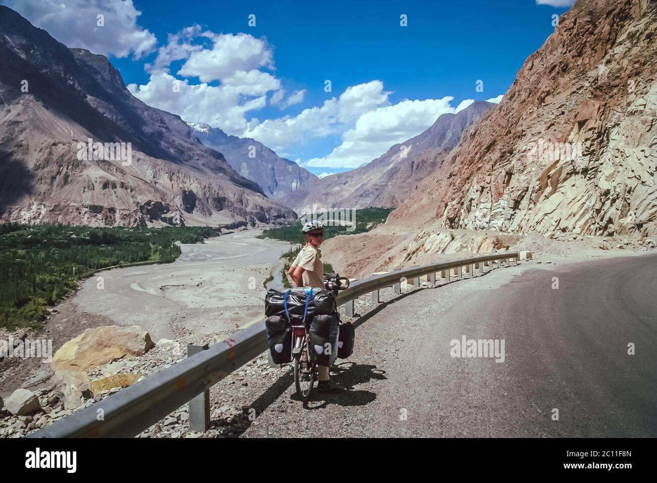 Cycling on Karakorum Highway Stock Photo - Alamy