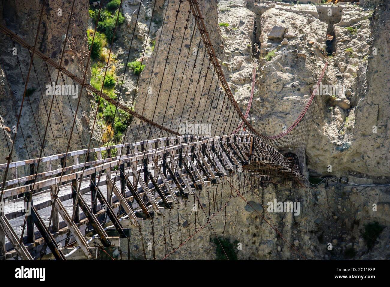 Old narrow hanging bridge hi-res stock photography and images - Alamy