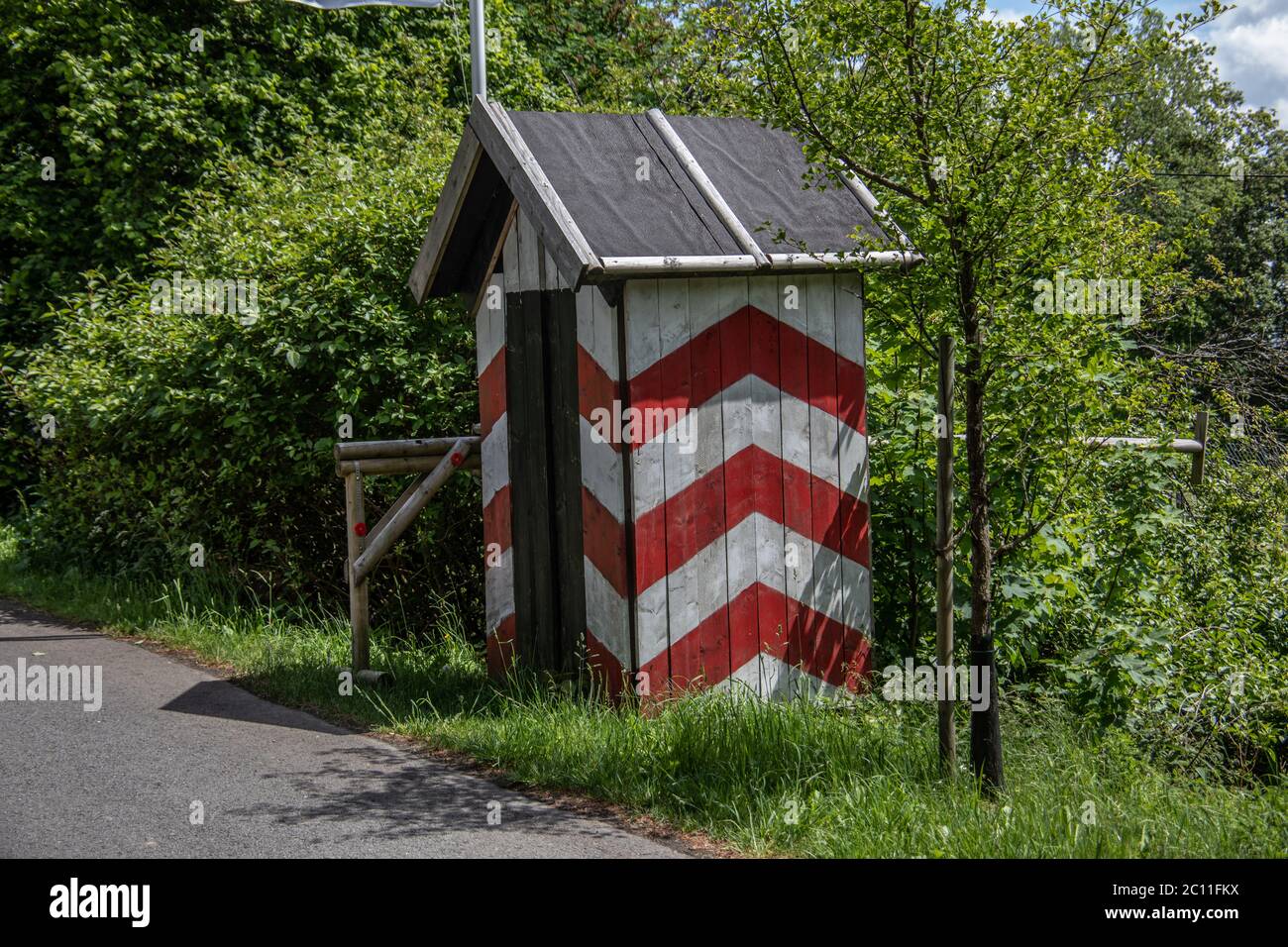 red and white striped guard house for border guards Stock Photo - Alamy
