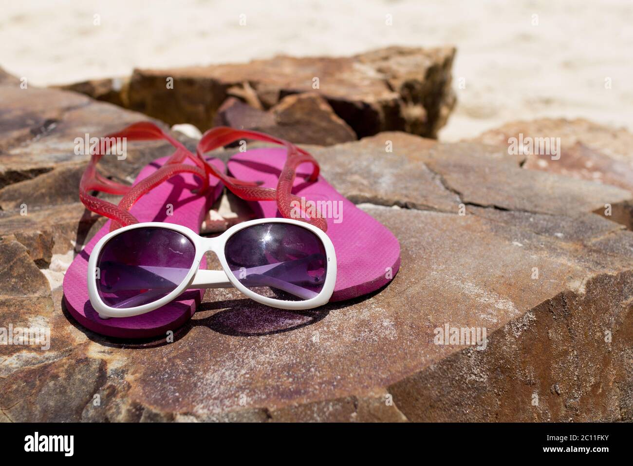 Summer vacation with concept Fashion sunglasses and Pink flip flop ...