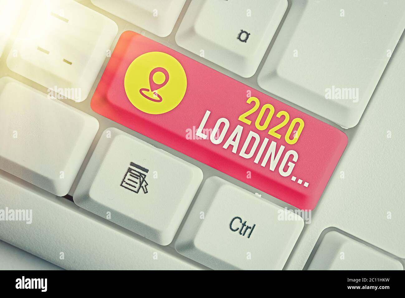 Writing note showing 2020 Loading.... Business concept for a year ...