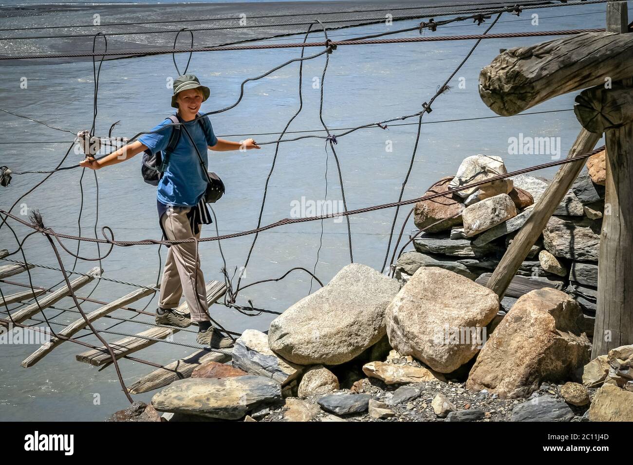 Crossing The Bridge Stock Photo - Alamy