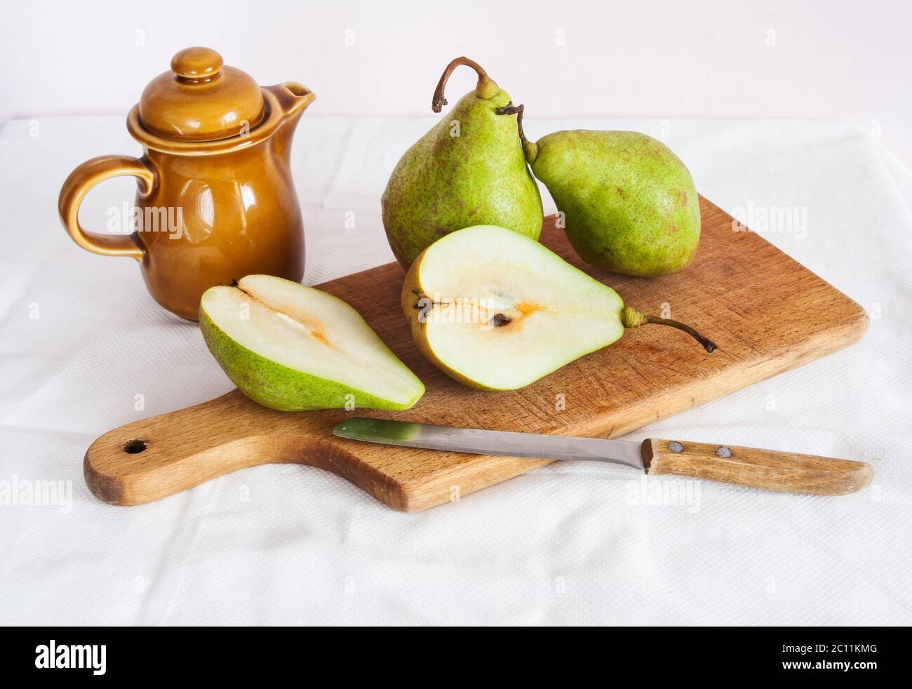 Beautiful still life with green pears Stock Photo - Alamy