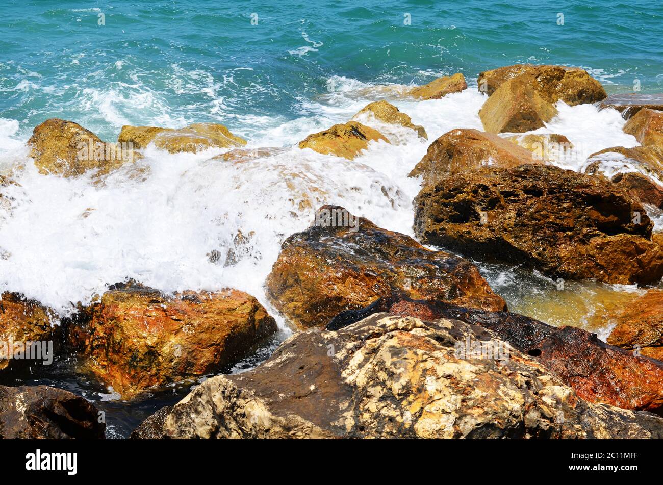 Waves and stones hi-res stock photography and images - Alamy