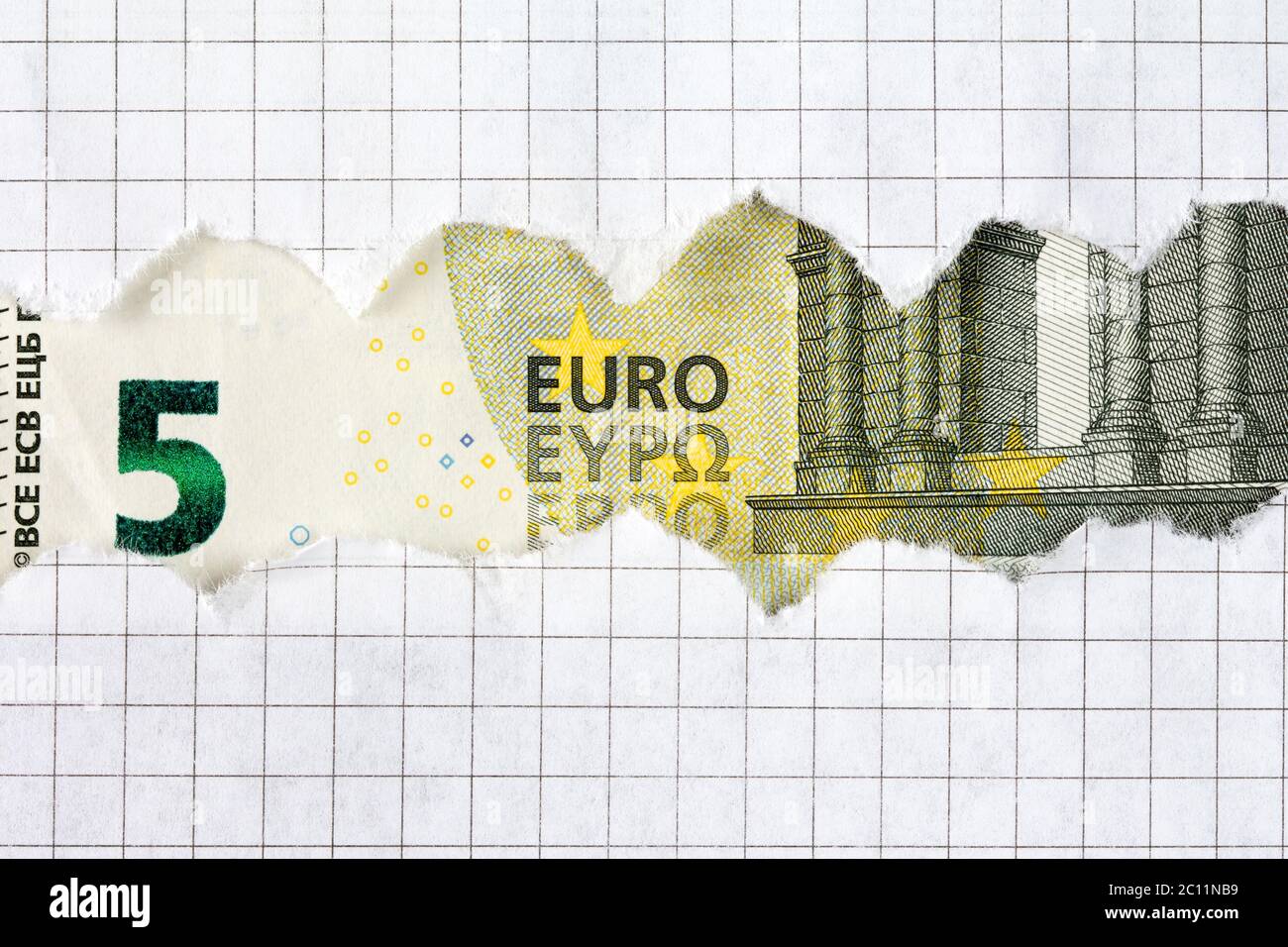 Five Euro in squared paper frame Stock Photo - Alamy