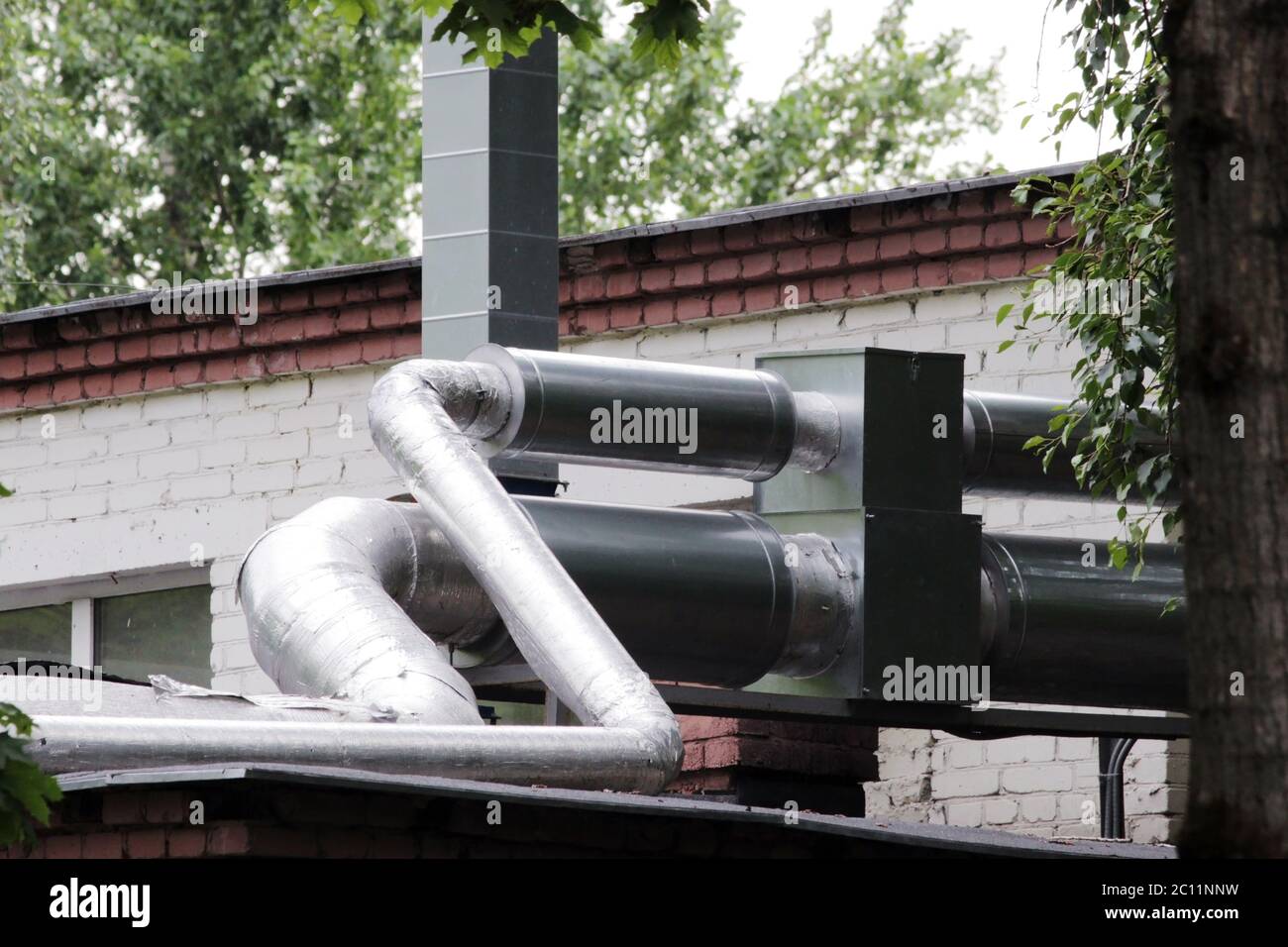 Pipe of ventilation is located a building Stock Photo - Alamy
