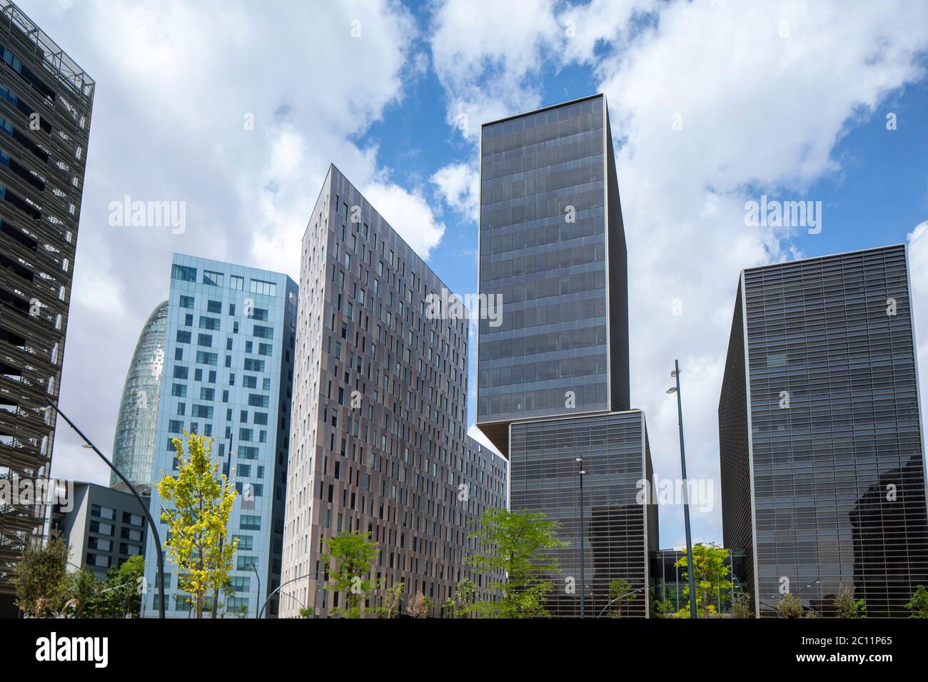 skyscrapers with clouds in sky, Barcelona, Spain Stock Photo - Alamy