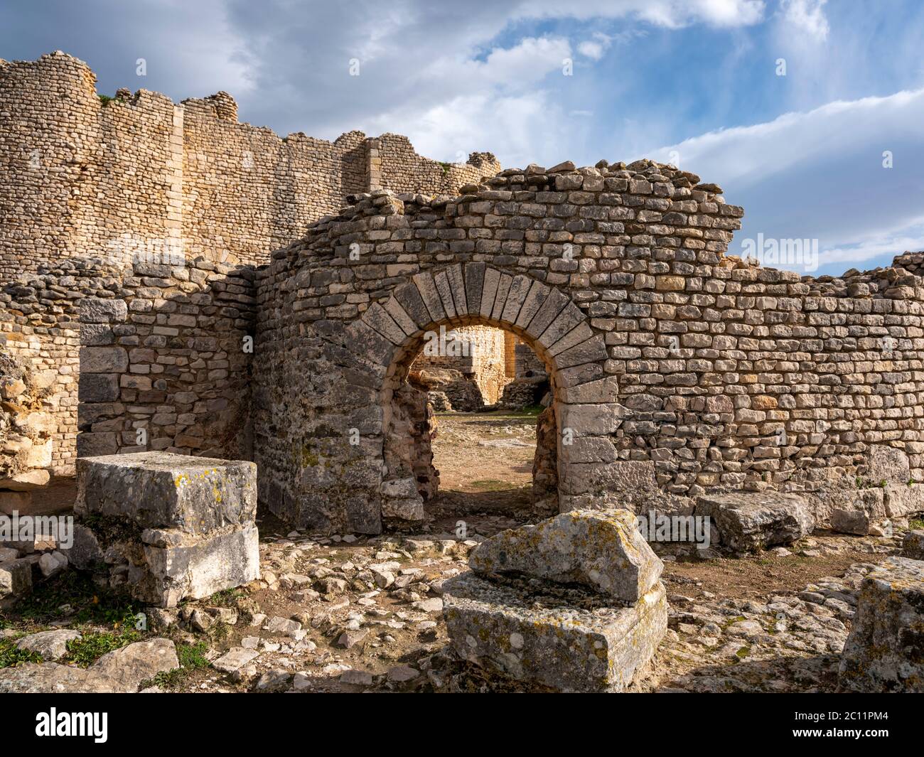 Perfect arch and ruins of the ancient Roman archeological site of ...