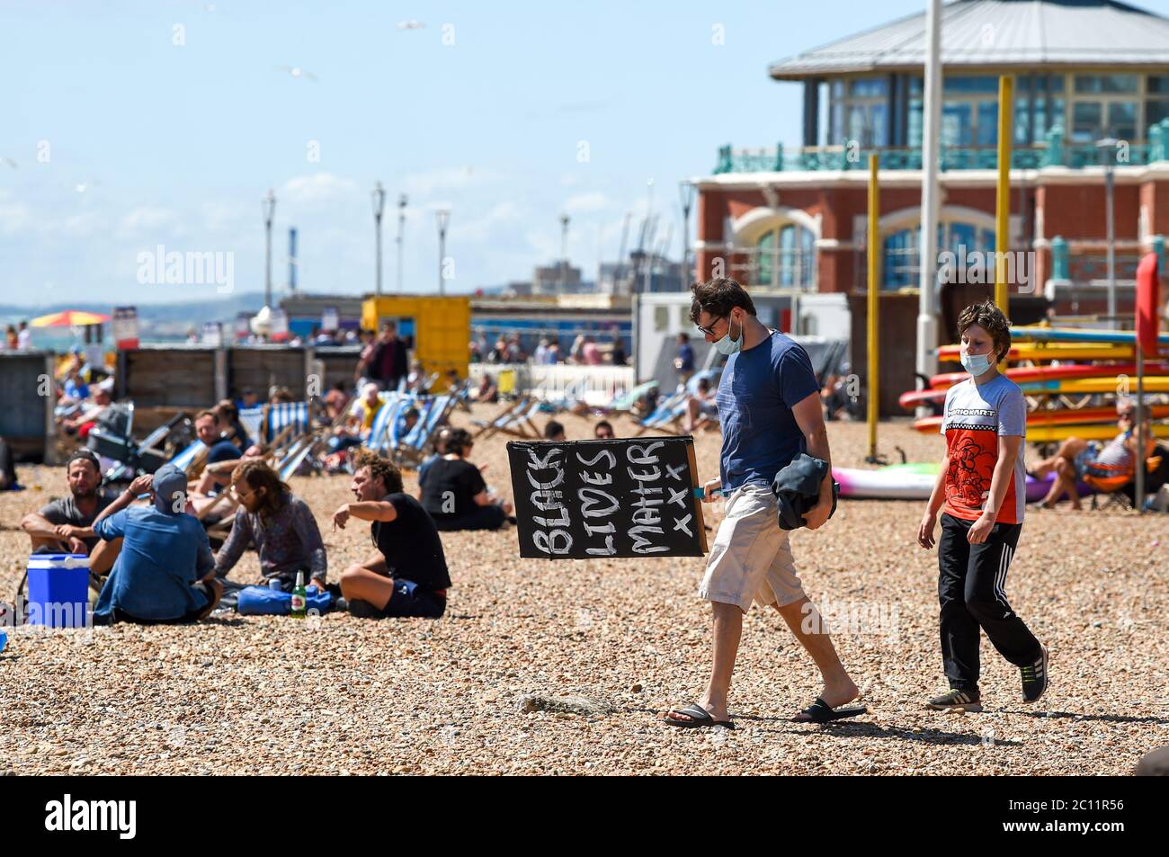 Racism protest on beach hi-res stock photography and images - Alamy