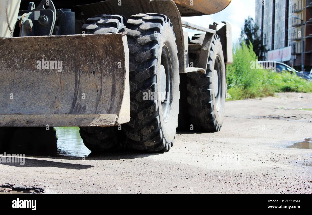 blade in the bulldozer and ground for construction work on the road ...