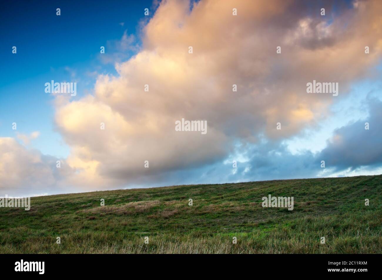 Dramatic sunset sky with clouds over rural field in Poland Stock Photo ...