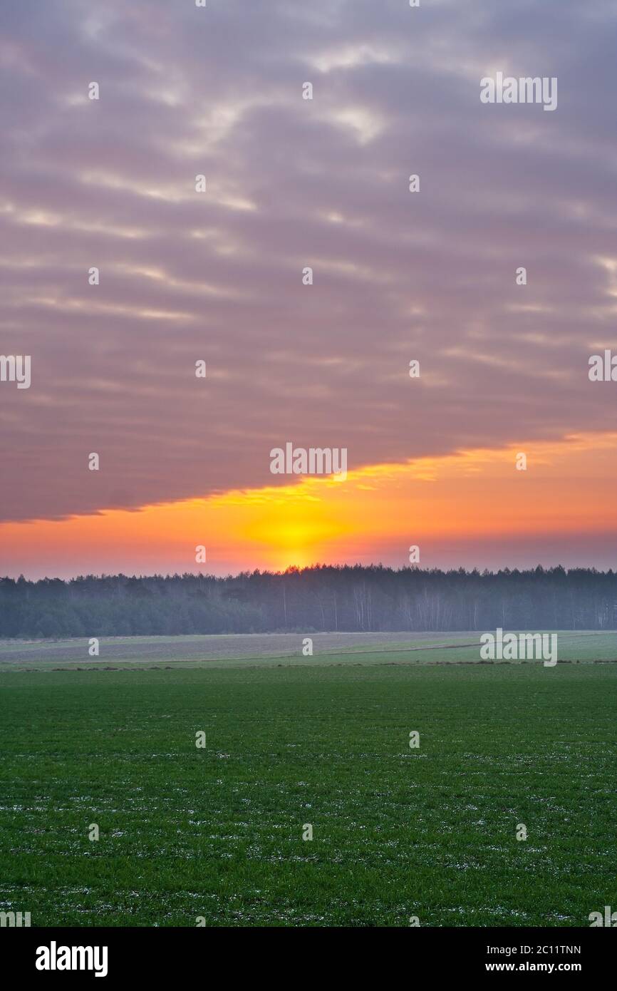 Vivid sky features sunset colors and wispy clouds Stock Photo - Alamy