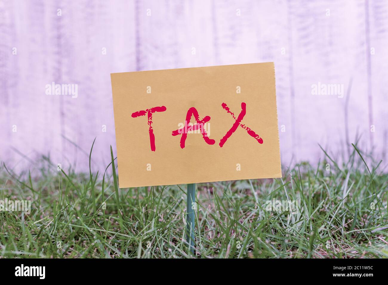 Writing note showing Tax. Business concept for compulsory financial ...