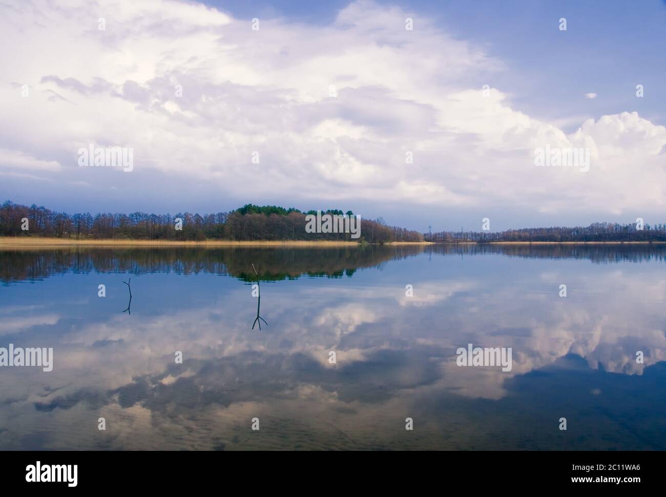 Beautiful calm lake with reflections in water photographed in sunset ...