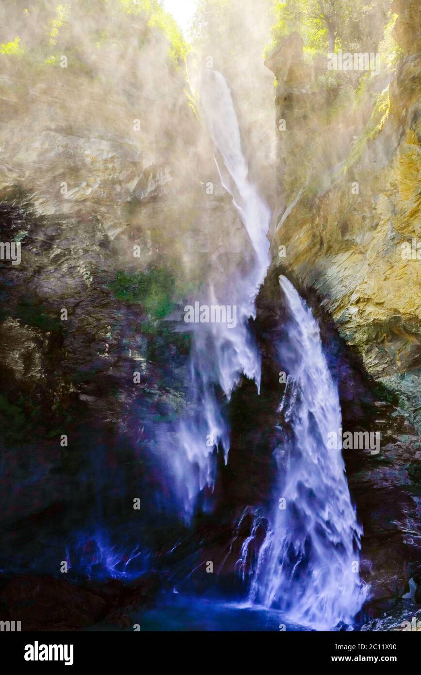 Famous Reichenbach waterfalls in strong winds and strong sunlight ...